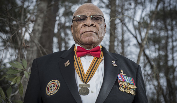 The inspiring story of the first black Marine on recruitment posters