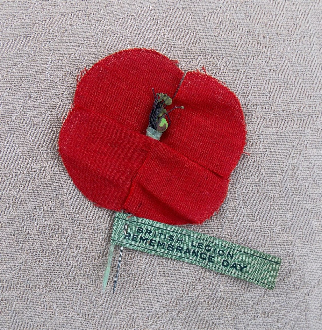 What do flowers represent when resting on the graves of the fallen?