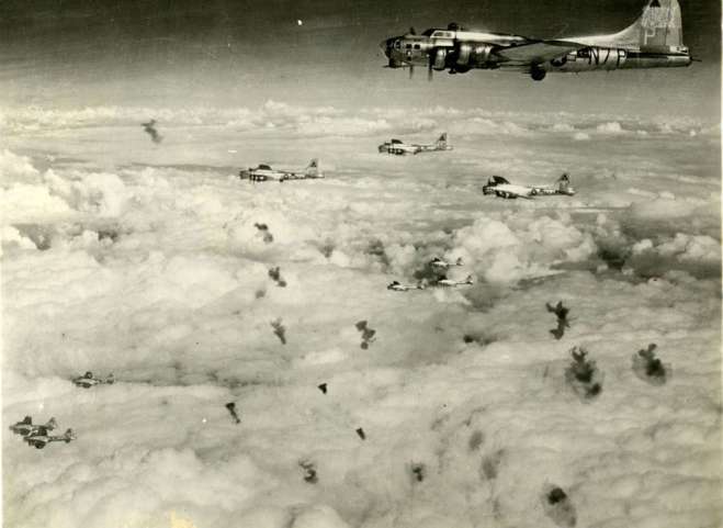 Harrowing photos show one B-17 bombing another B-17 in combat