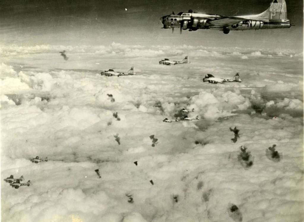 Harrowing photos show one B-17 bombing another B-17 in combat
