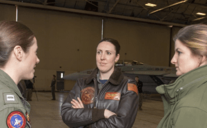 Fighter Pilot Lt. Amanda Lee is flying through barriers