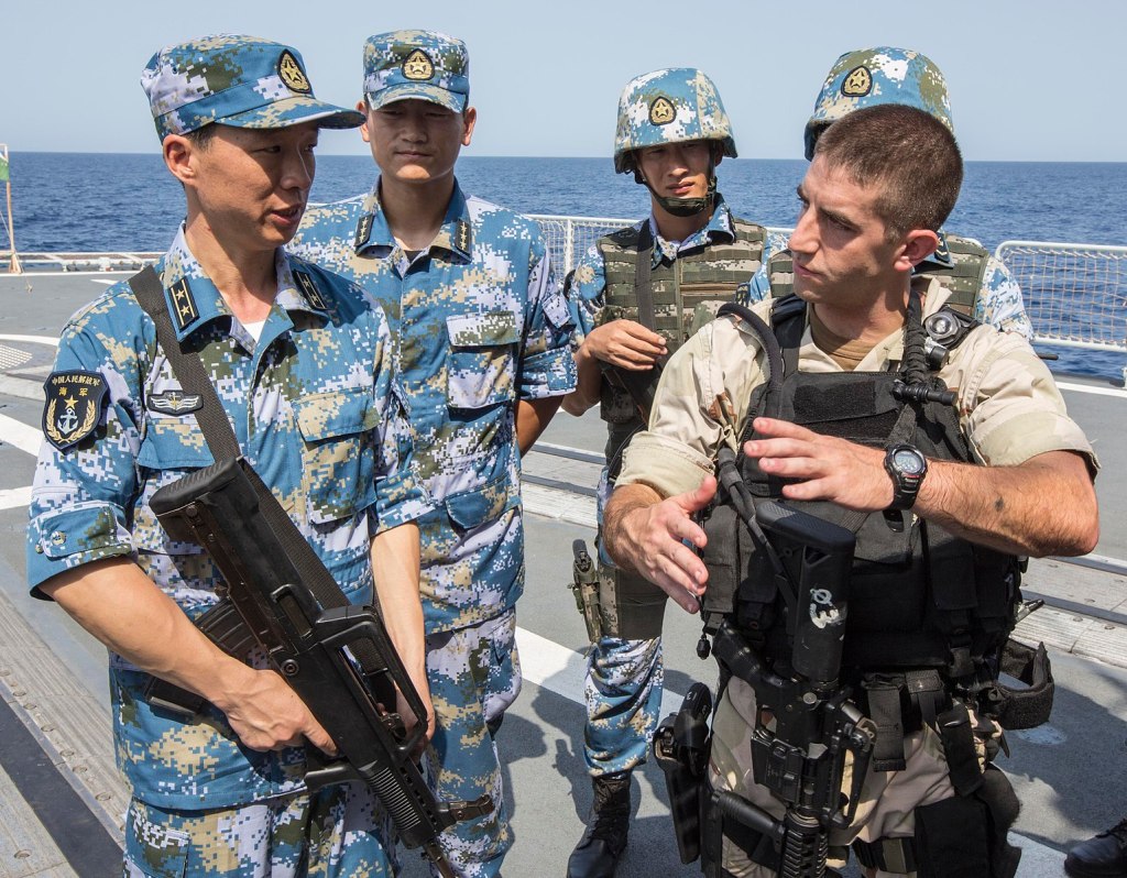 Why the Chinese military uses ridiculously blue uniforms