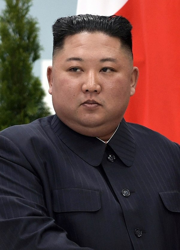 Why Kim Jong Un appears to be followed by hordes of people taking notes