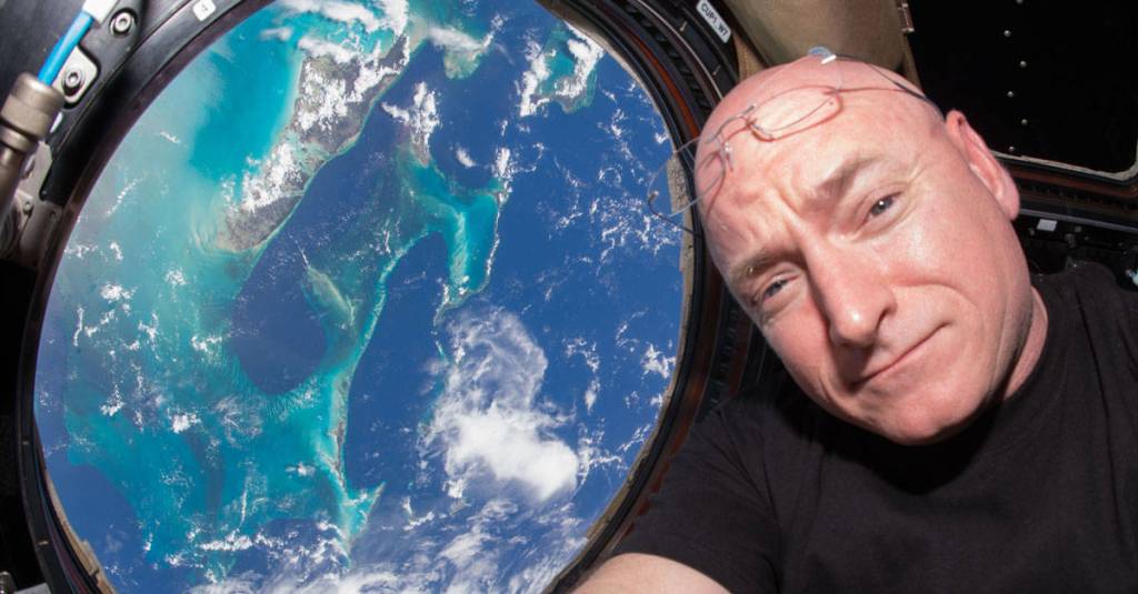 Astronaut and retired Navy Captain Scott Kelly returns to Earth after a ...